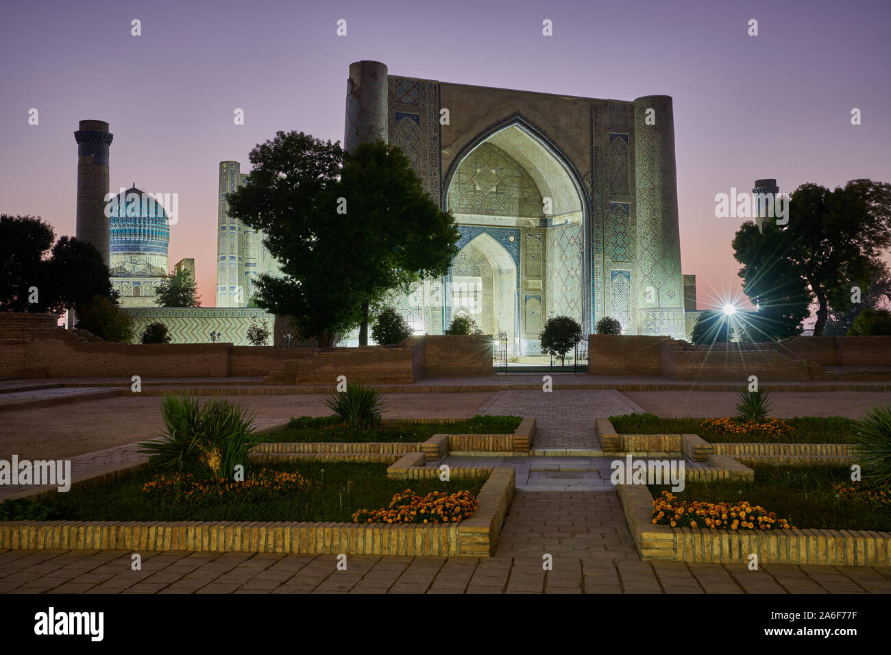 illuminated Bibi-Khanym Mosque or Bibi Khanum Mosque after sunset ...
