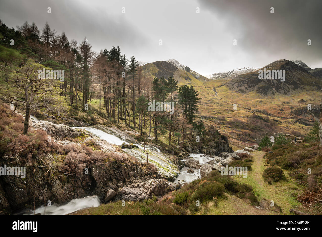 Beautiful landscape image of Ogwen Valley river and waterfalls during ...