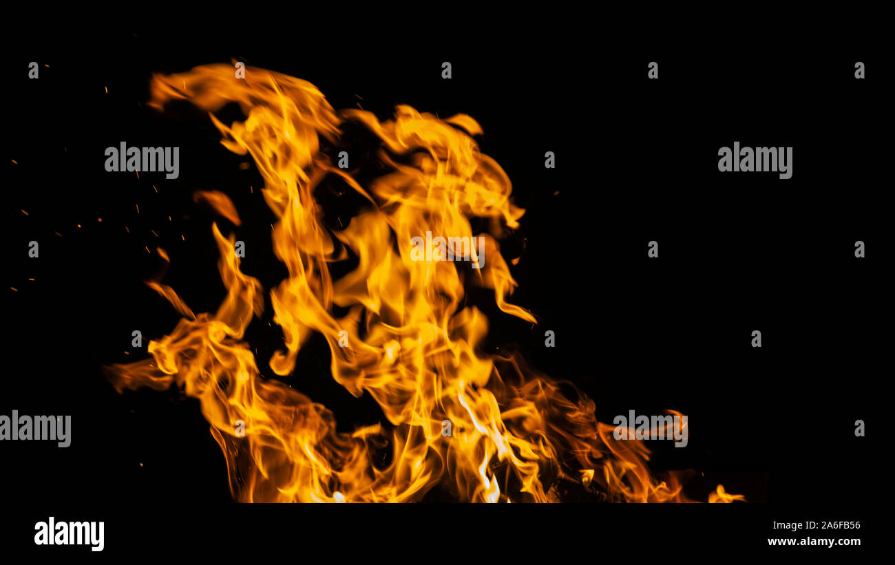 Burning with flames Orange and red fire isolated on black background ...