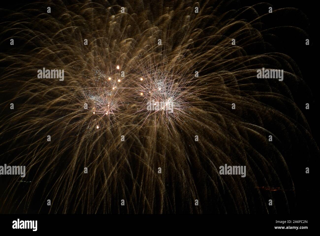 Great fireworks in the dark night sky Stock Photo - Alamy