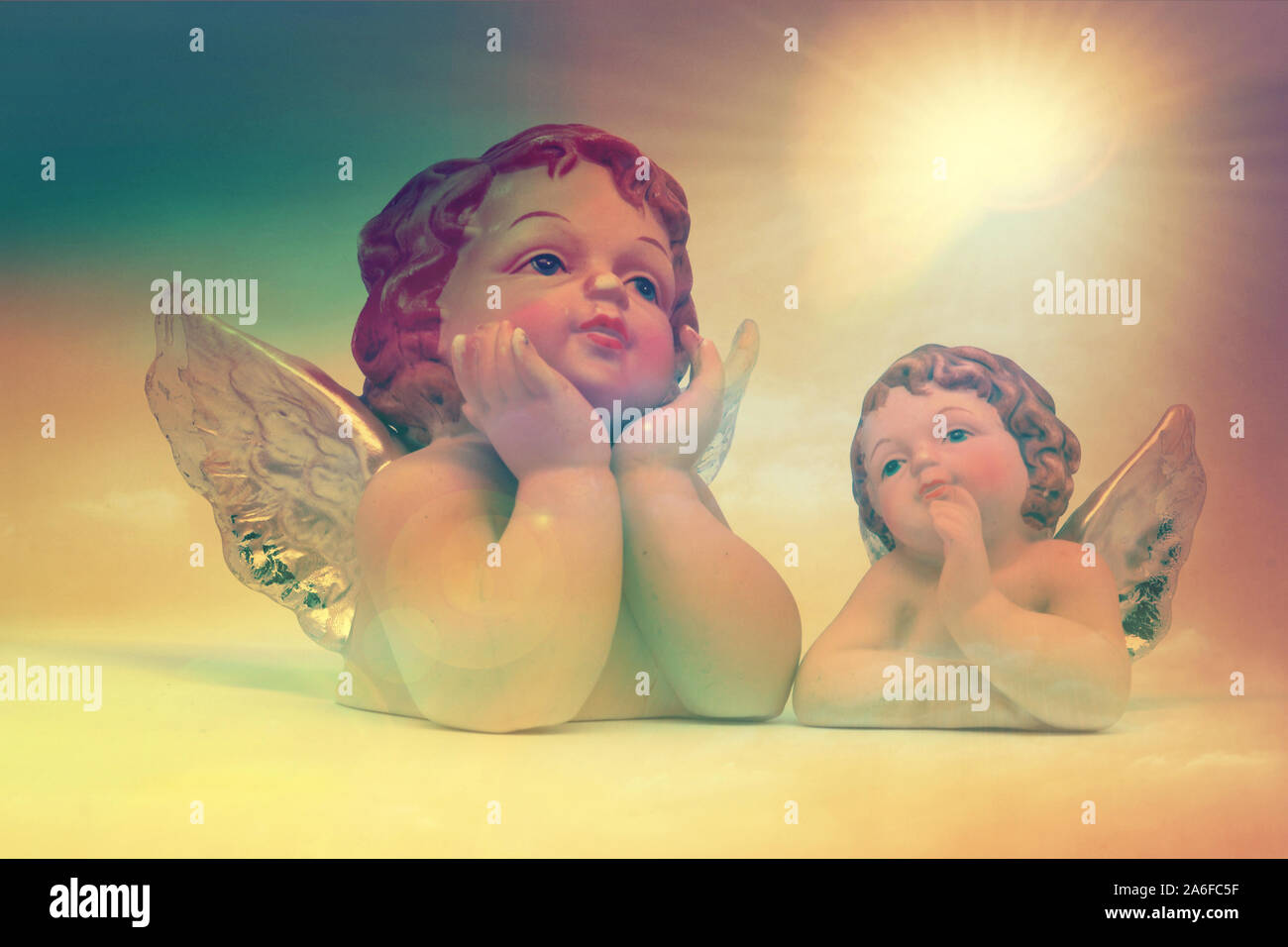 Putti Angel with retro background Stock Photo - Alamy