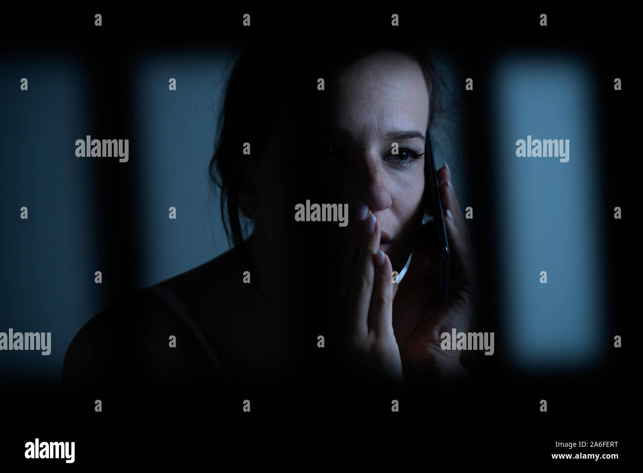 Woman prisoner inside jail cell hi-res stock photography and images - Alamy