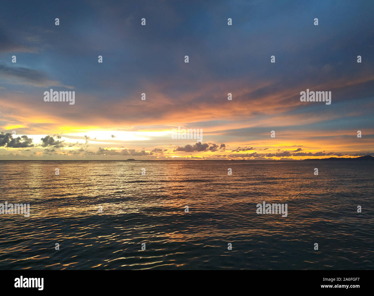 Beautiful sunset sky above clouds with dramatic light Stock Photo - Alamy