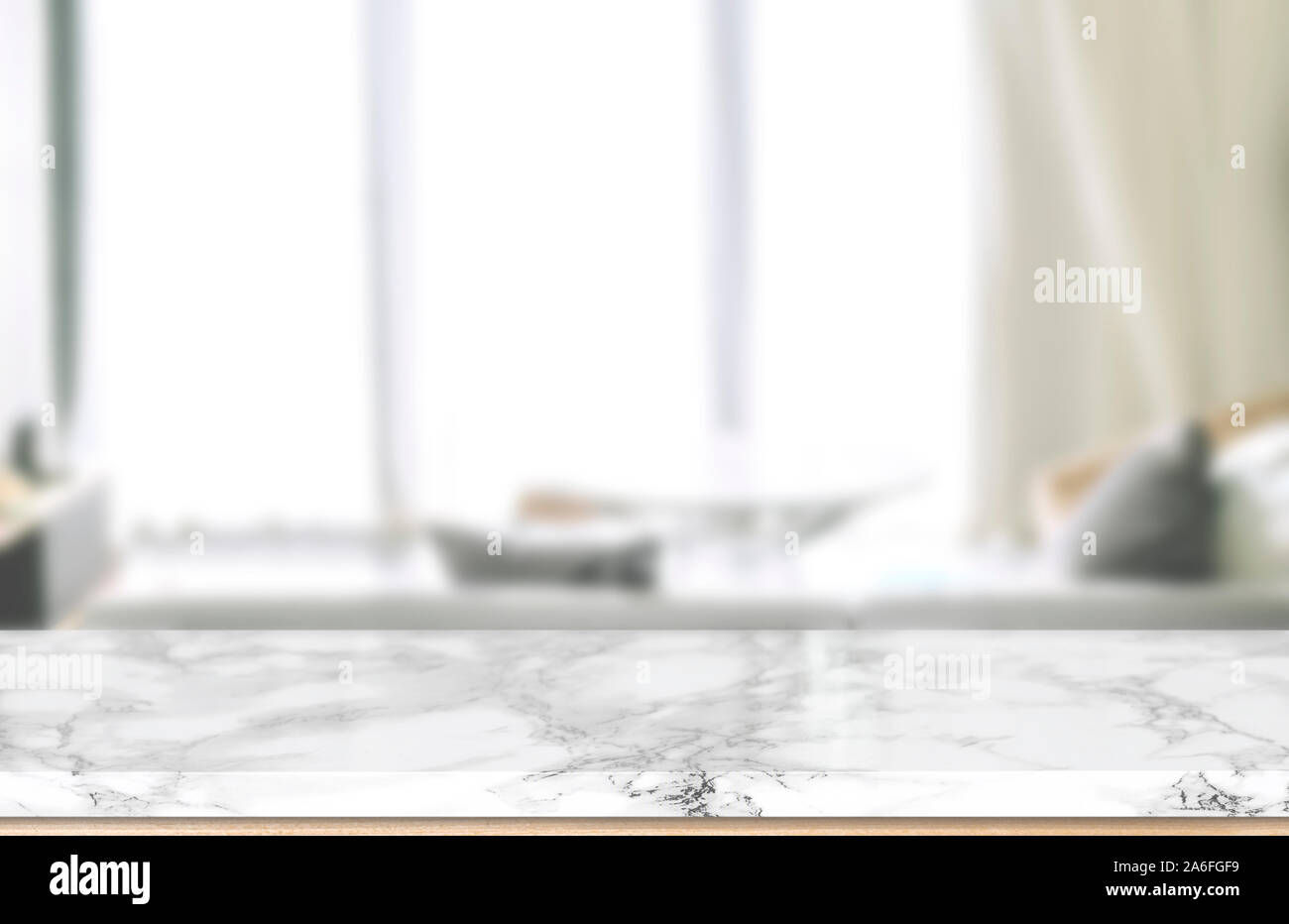 wooden table top with blur of modern living room interior Stock Photo ...