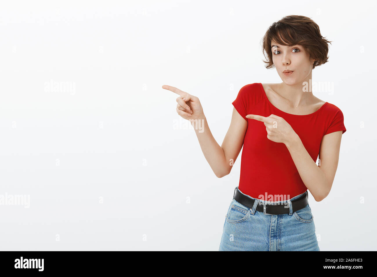 Pointing to the left side hi-res stock photography and images - Alamy