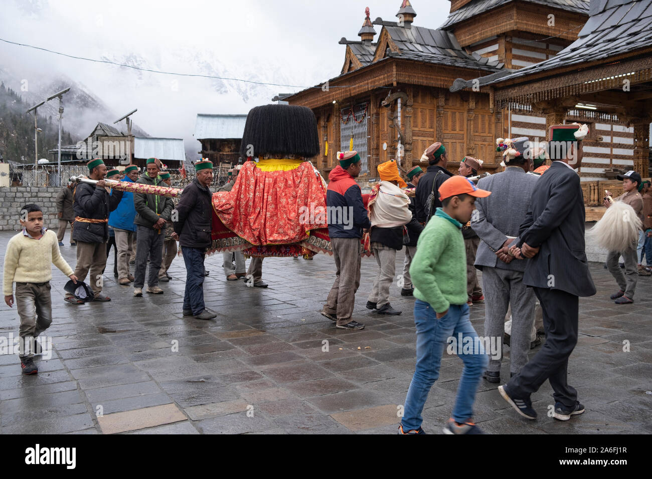 The deity of Mathi is taken out on a palanquin to circumambulate the ...