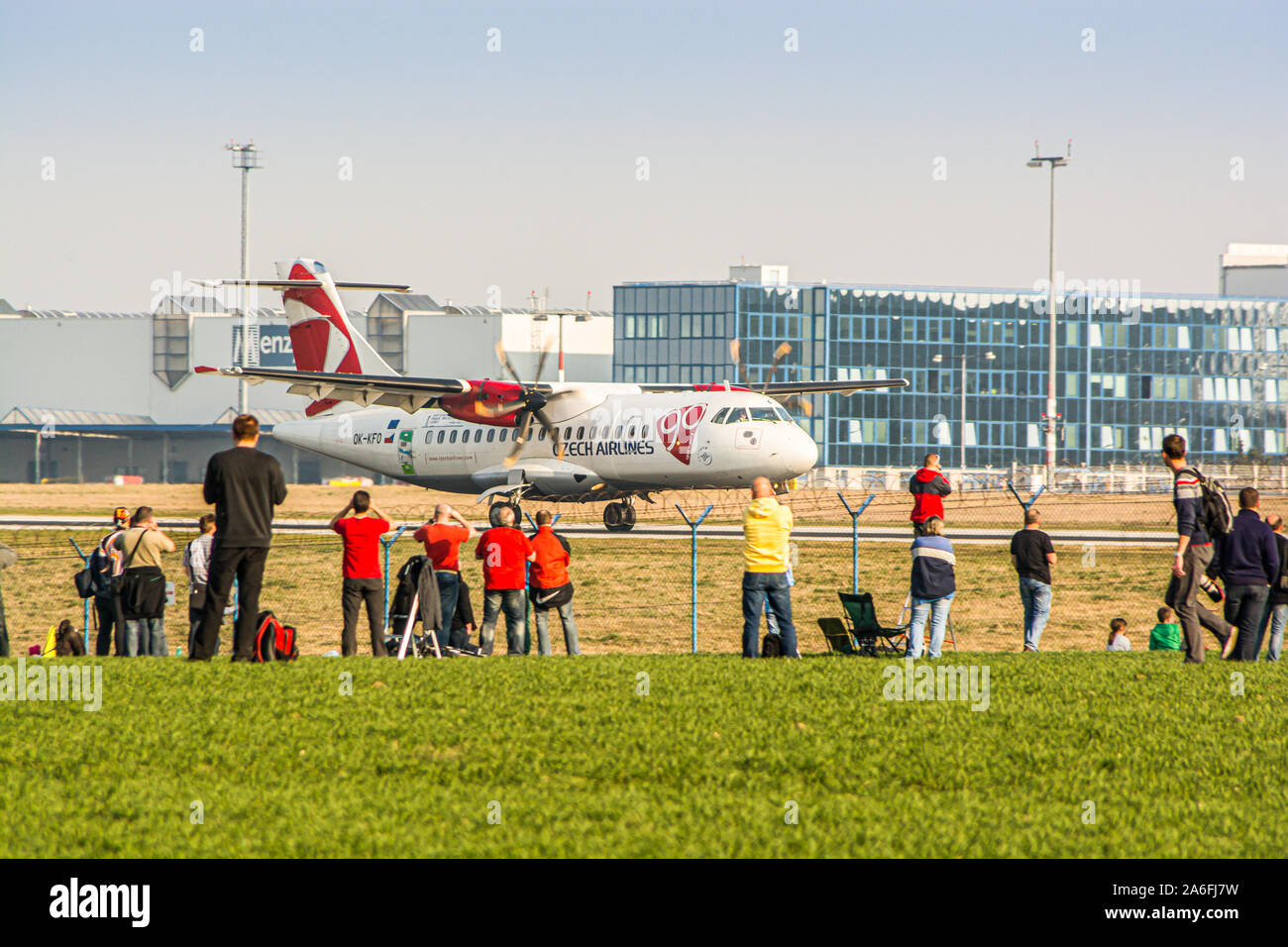 Prague, Czech Republic - March 14, 2014. People watching airplanes ...