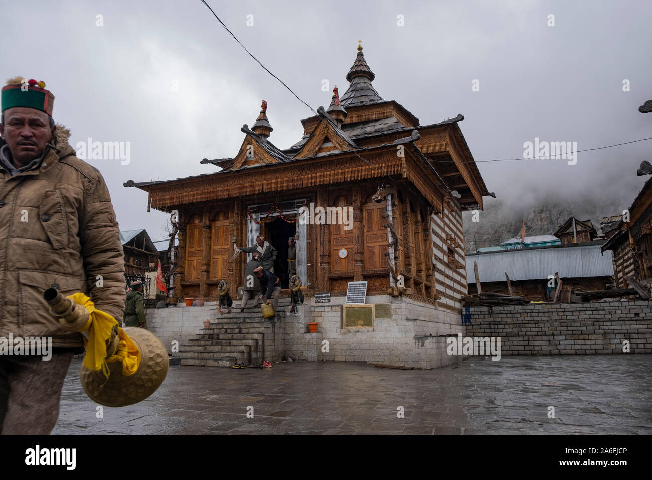 Locals take out wind instruments from the Mathi temple for a local ...