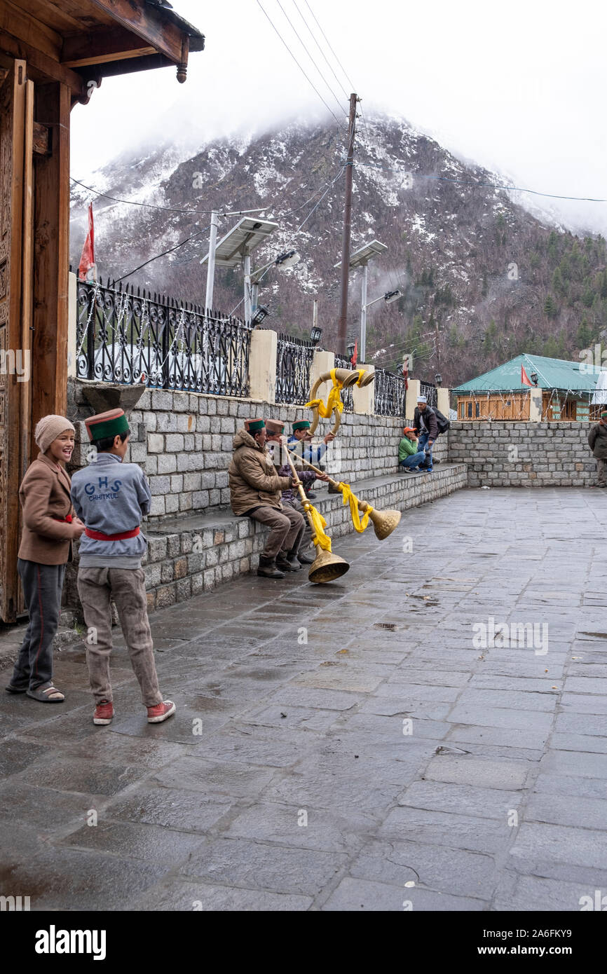 Musicians play at a local wedding at Chitkul. The wedding takes place ...
