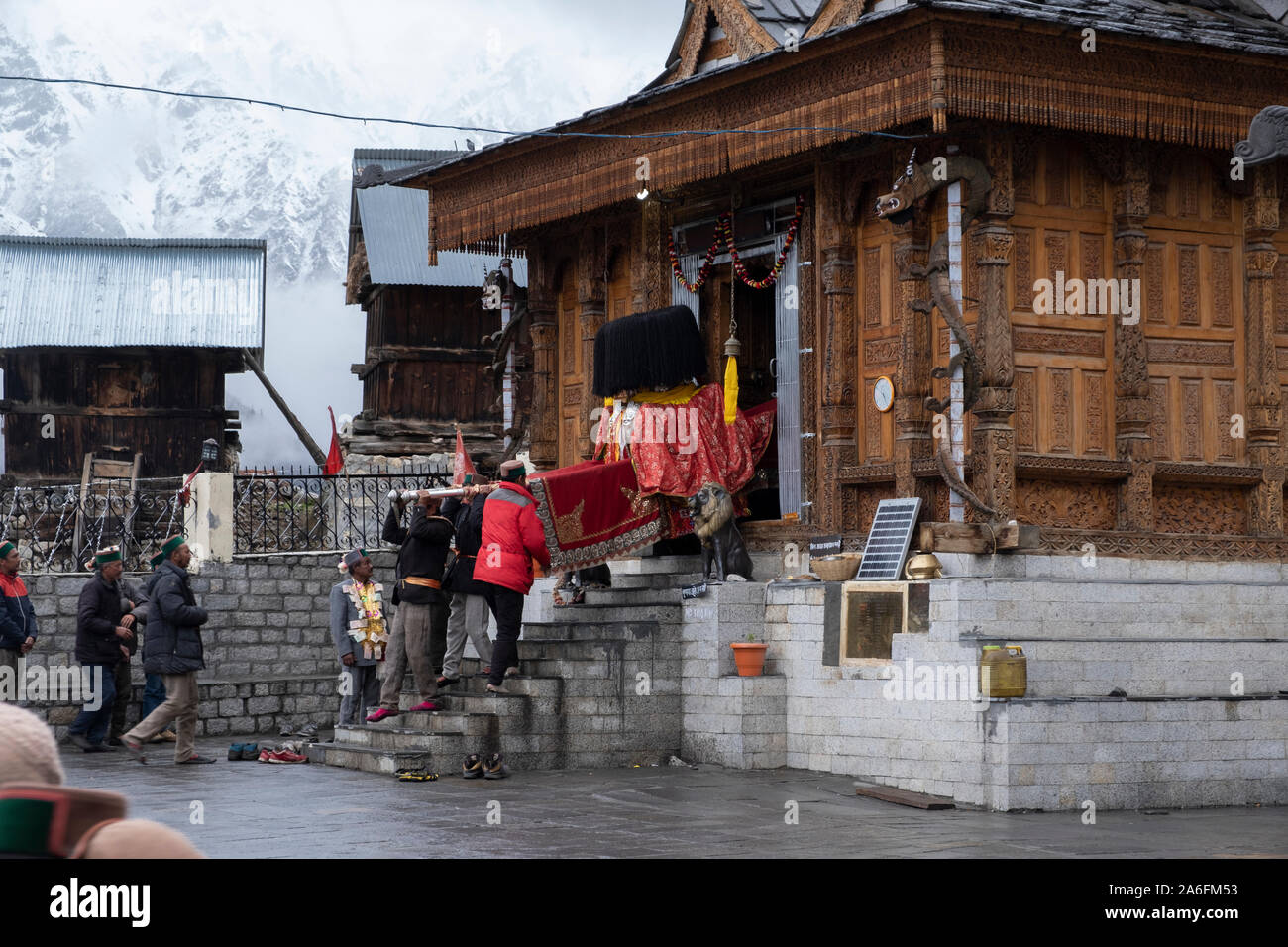 The Mathi deity is being brought of the temple on a palanquin for a ...