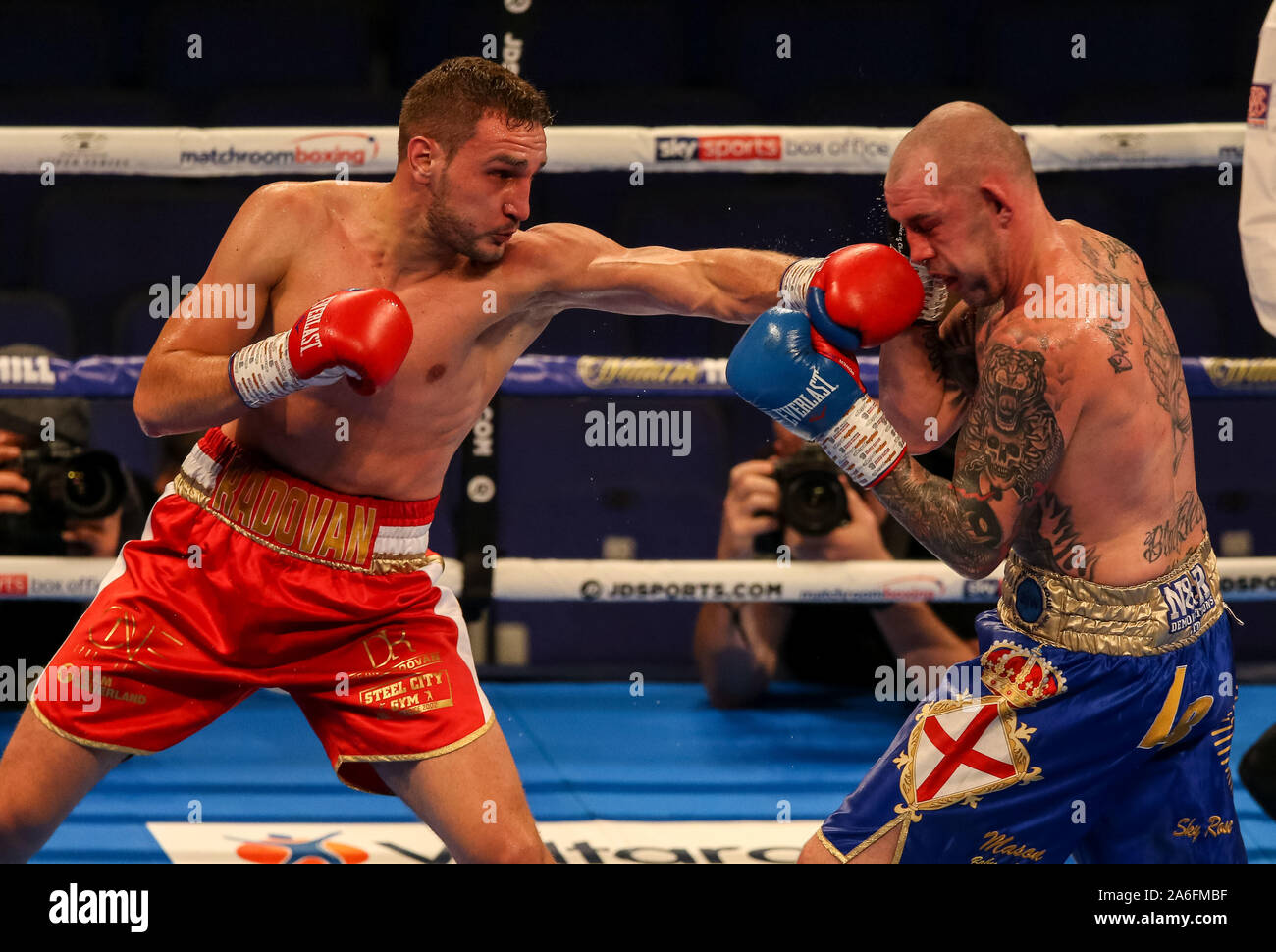 Denis Radovan (left) during his bout with Luke Blackledge (right) at ...
