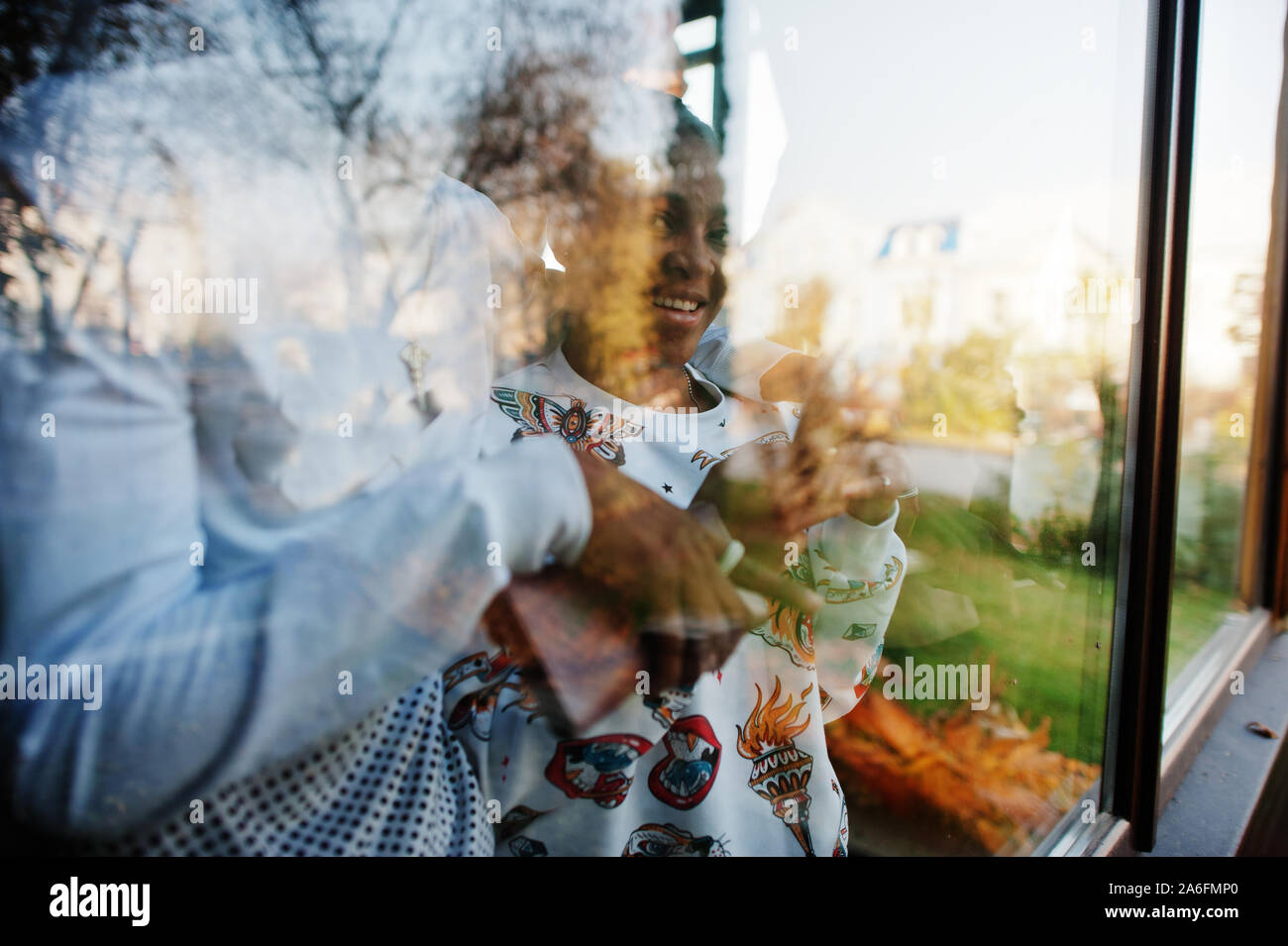 Happy african friends chatting in cafe. Group of black peoples meeting ...