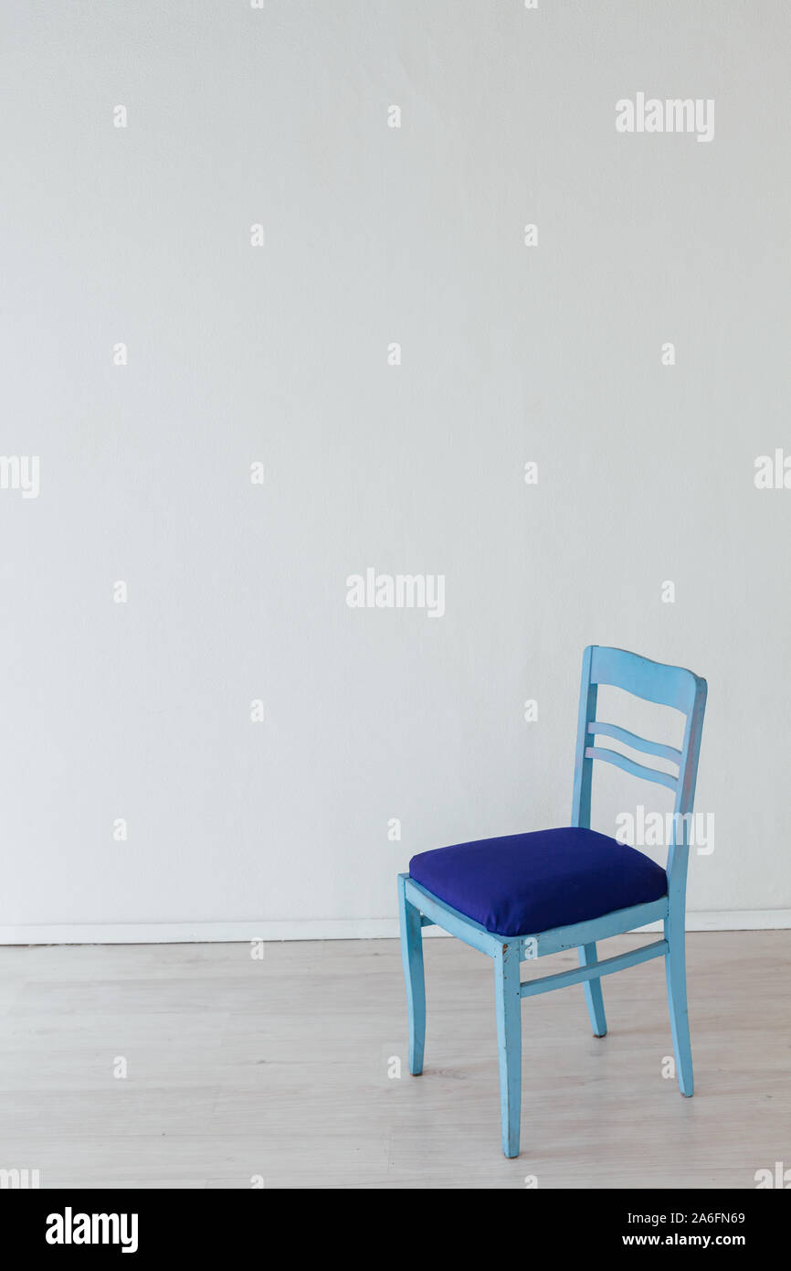 one chair in the interior of an empty white room Stock Photo - Alamy