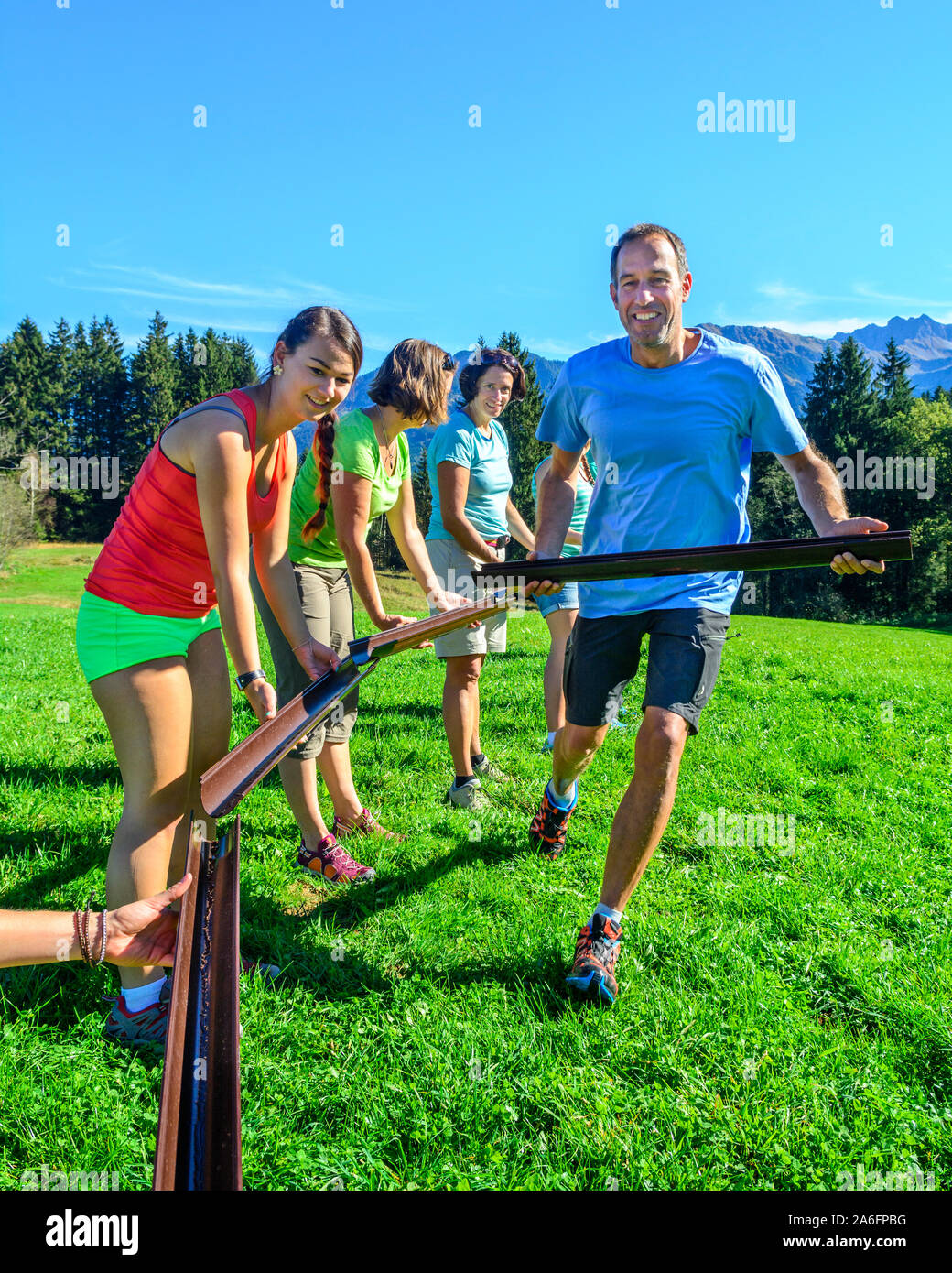 Teambuilding exercises in autumnal nature Stock Photo - Alamy