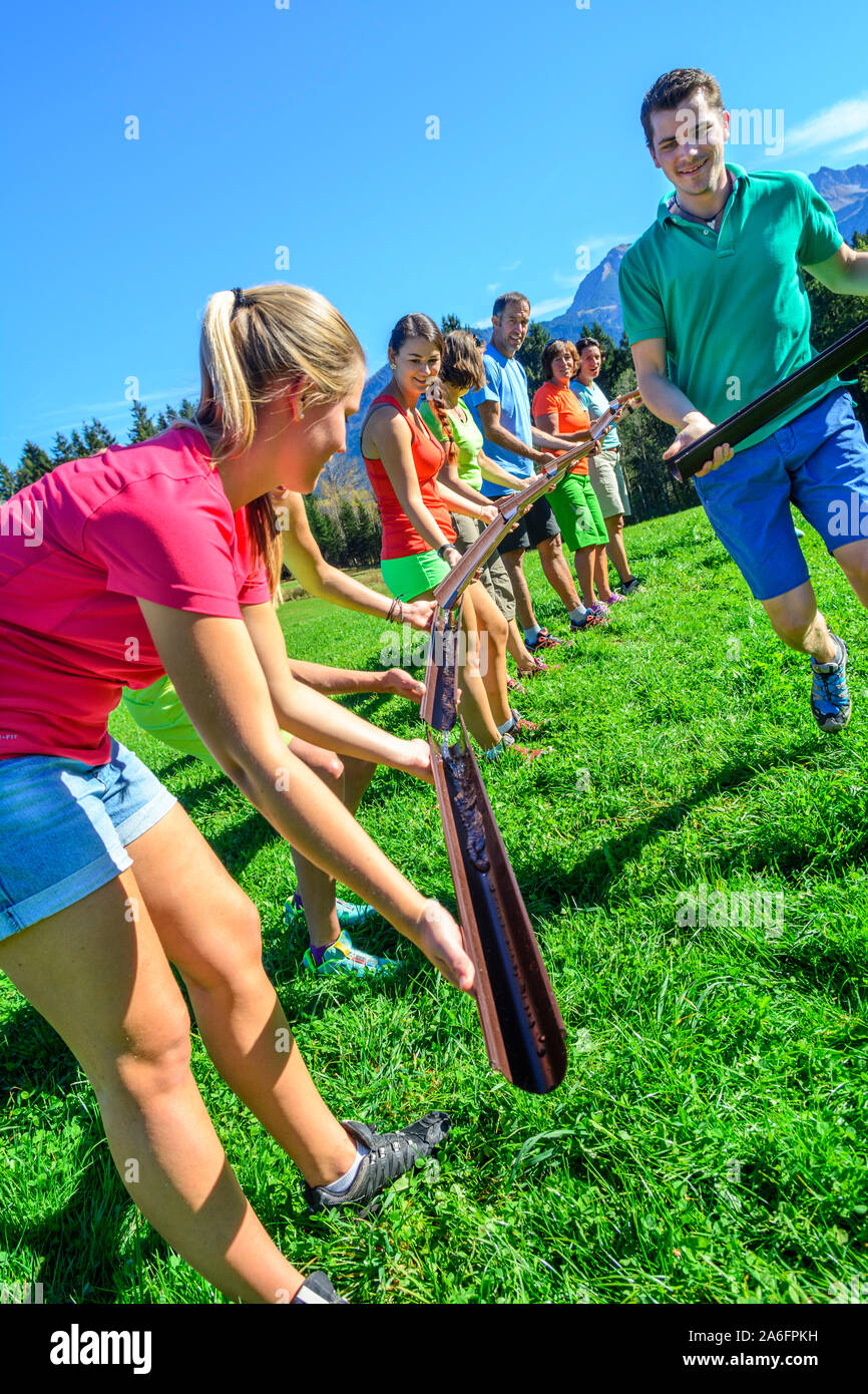 Teambuilding exercises in autumnal nature Stock Photo - Alamy