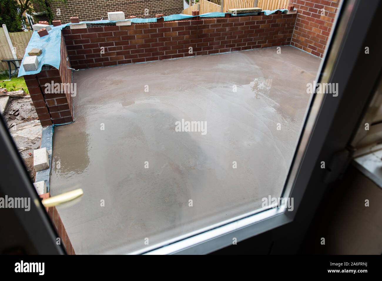 Work commences on the foundations of a conservatory base, laying ...