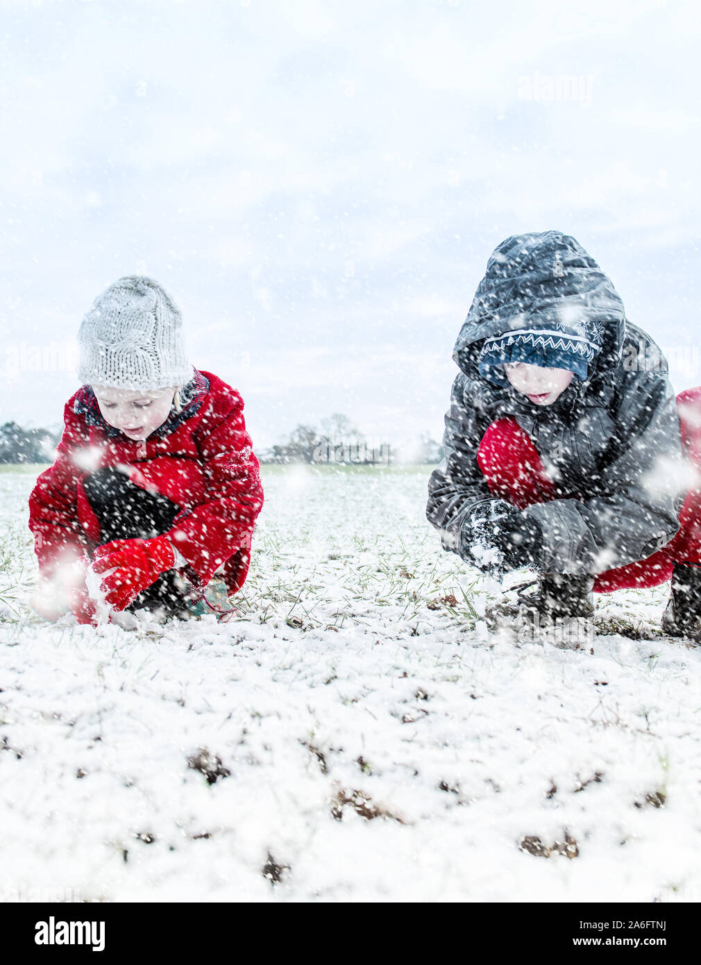 A little boy with ADHD, Autism, Aspergers Syndrome playing in the heavy ...