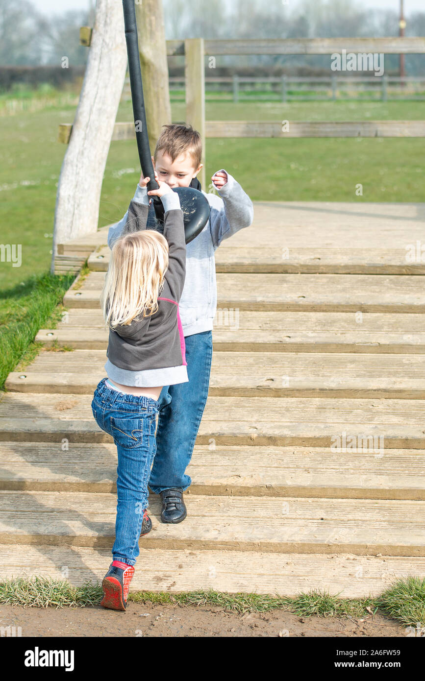 A handsome boy with ADHD, Autism, Asperger Syndrome plays with his ...