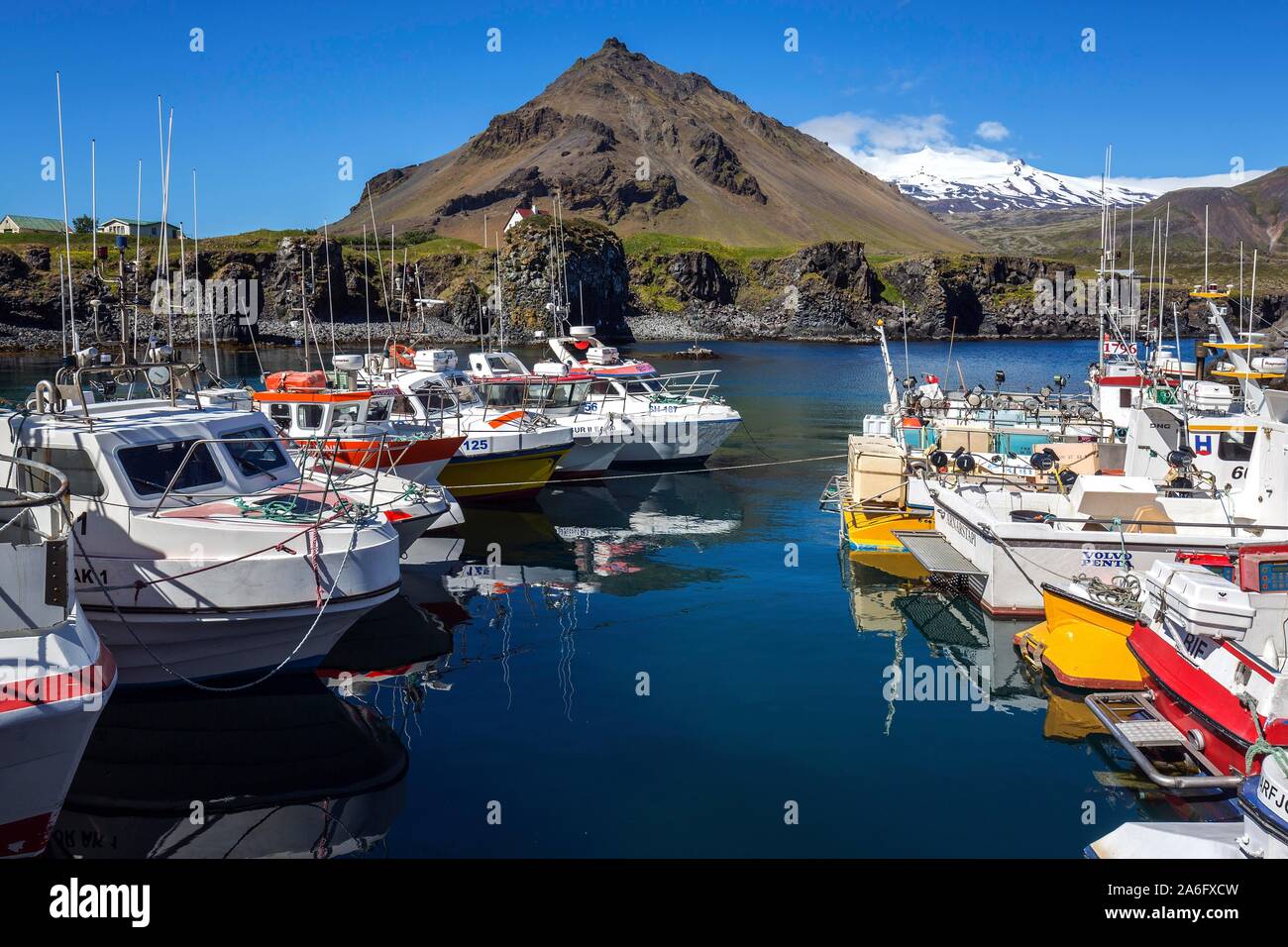 Arnarstapi harbour, behind Stapafell mountain and Snaefelljokull ...