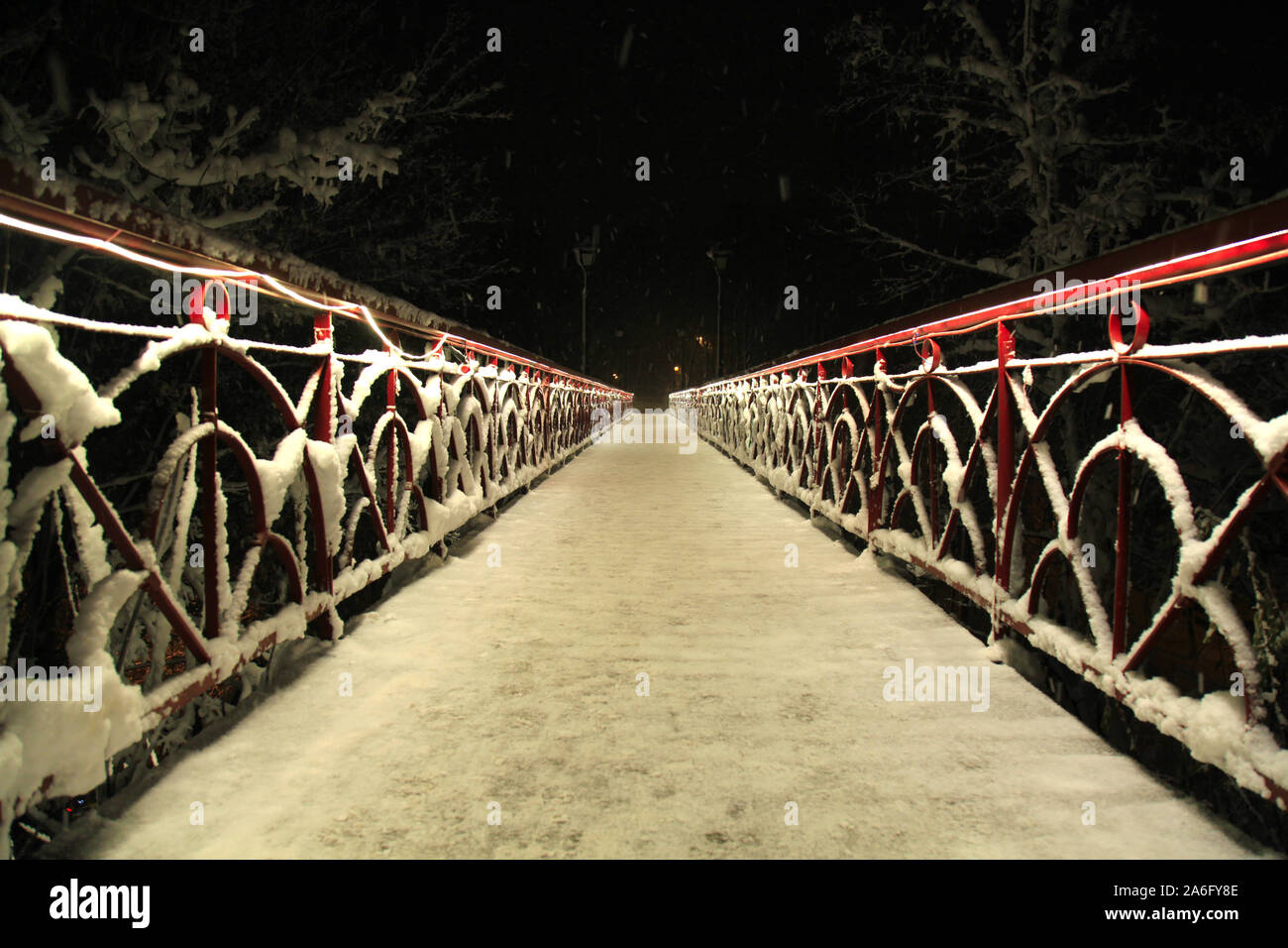 New Year celebration. The bridge into the night. Christmas bridge under ...