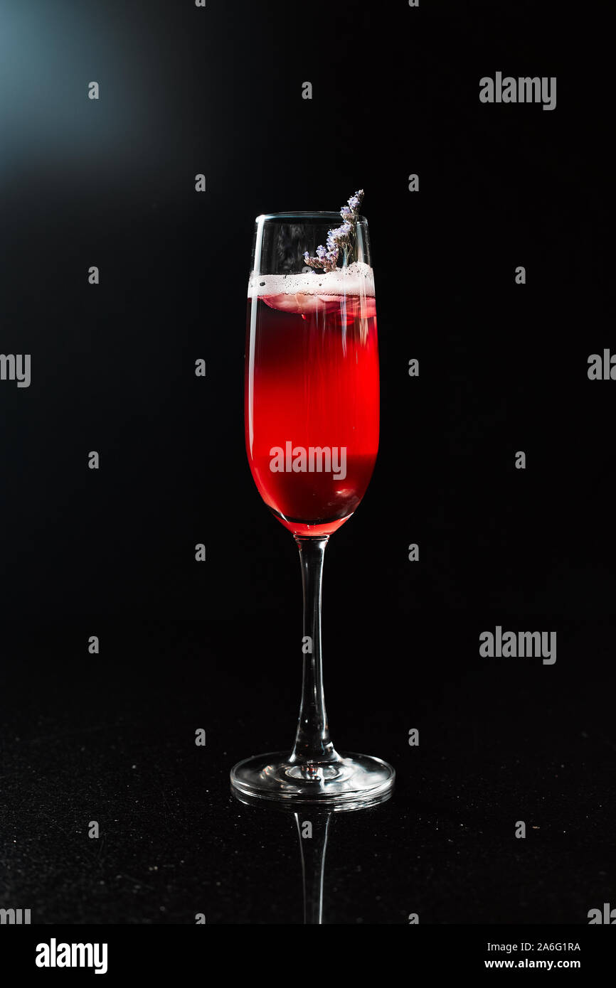 Sweet red berry summer cocktail on the bar counter Stock Photo - Alamy