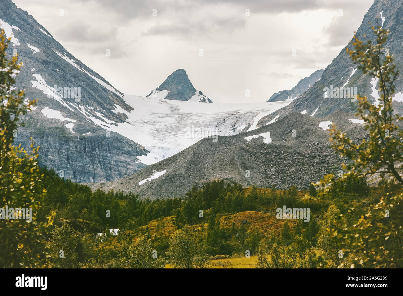Norway mountains landscape Steindalsbreen glacier and forest in Lyngen ...