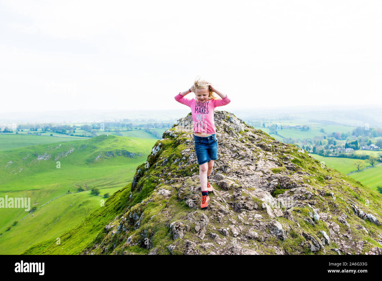 A pretty little girl, hikes and climbs in the great outdoors of the ...