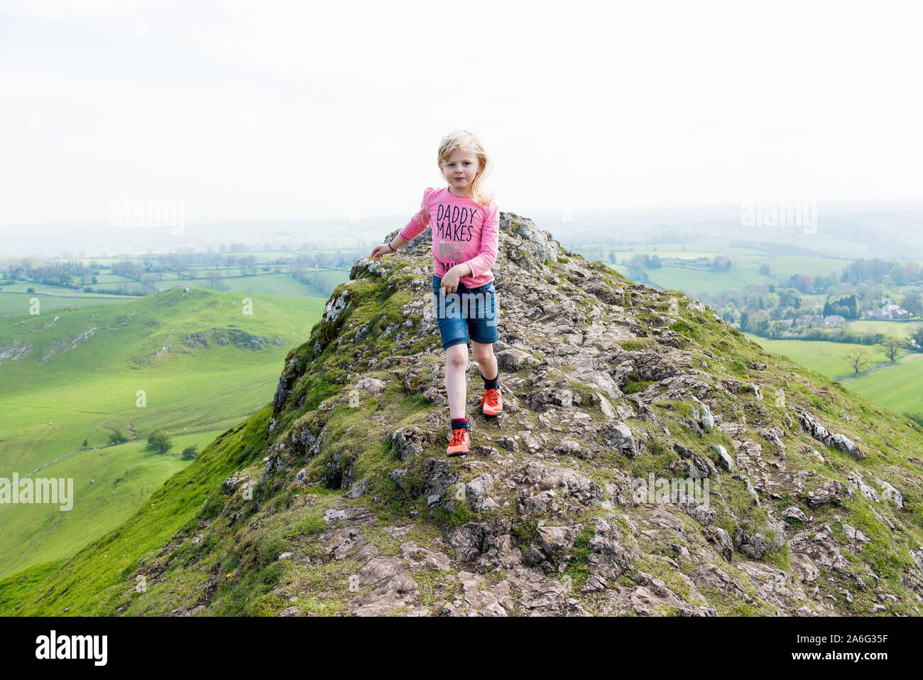 A pretty little girl, hikes and climbs in the great outdoors of the ...