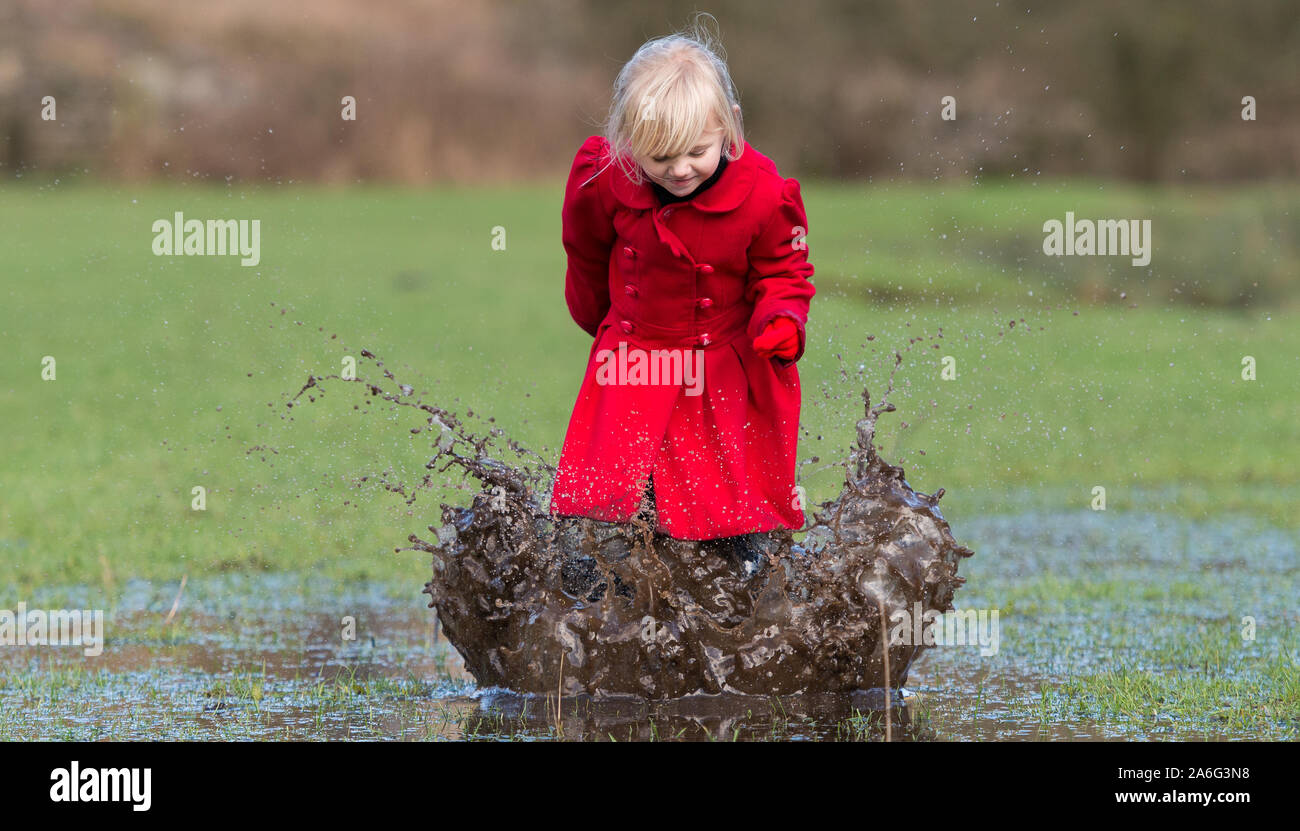 Jumping puddles children hi-res stock photography and images - Alamy