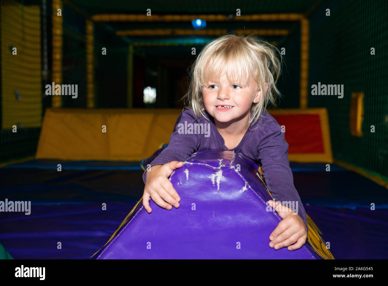 A cute little girl playing in a soft play area, Funsters, safe children ...