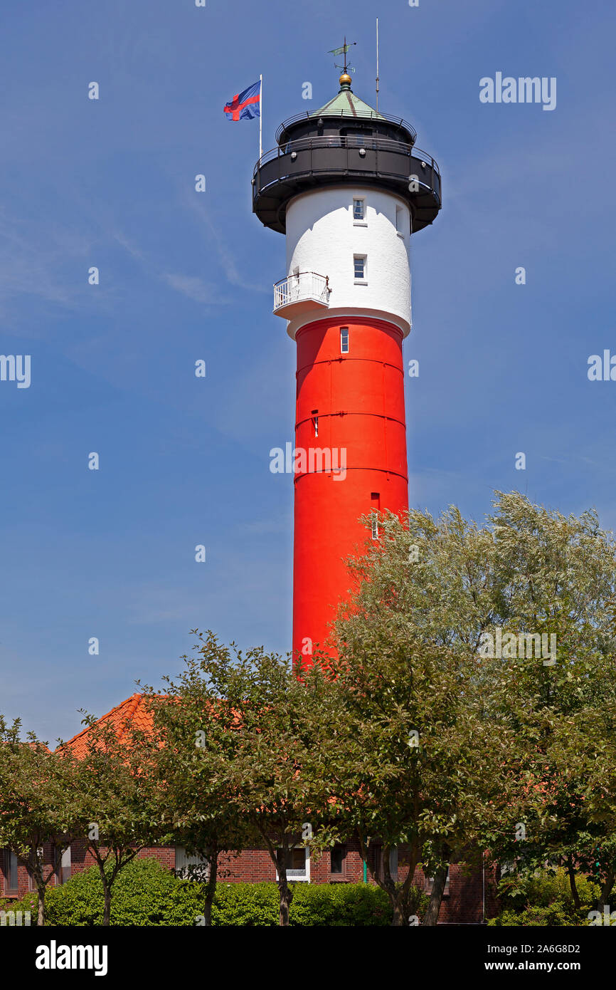 The old lighthouse on Wangerooge Island in East Friesland, Germany, is ...