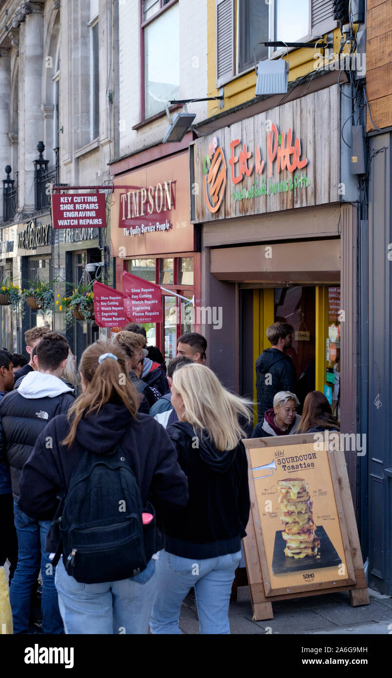 Students Queue for Lunch at Eat a Pitta on Park St Bristol Stock Photo ...