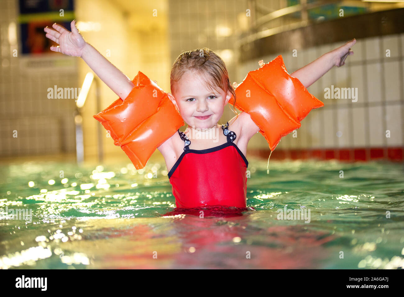 Girl aqua suit hi-res stock photography and images - Alamy