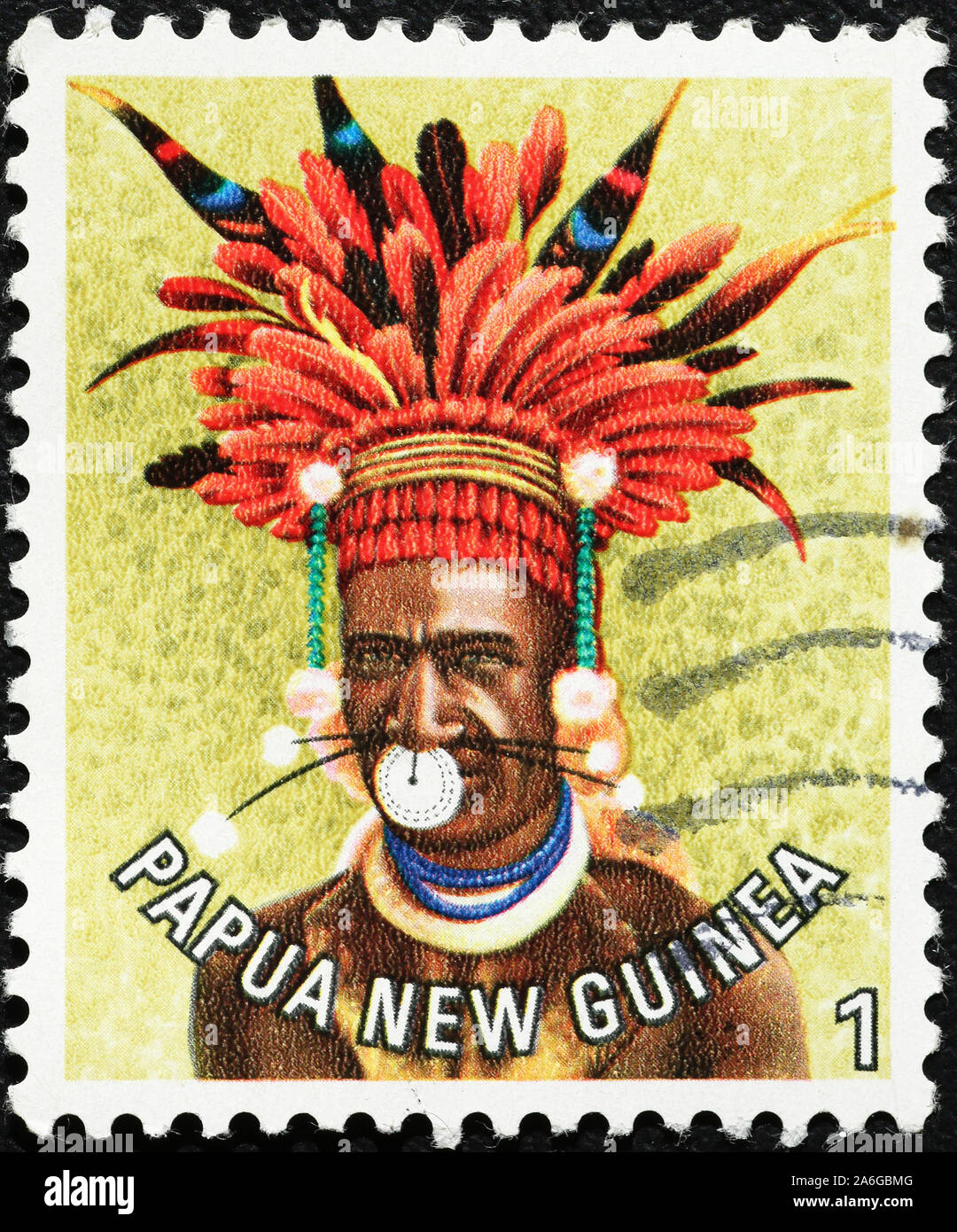 Papuan native on postage stamp Stock Photo - Alamy