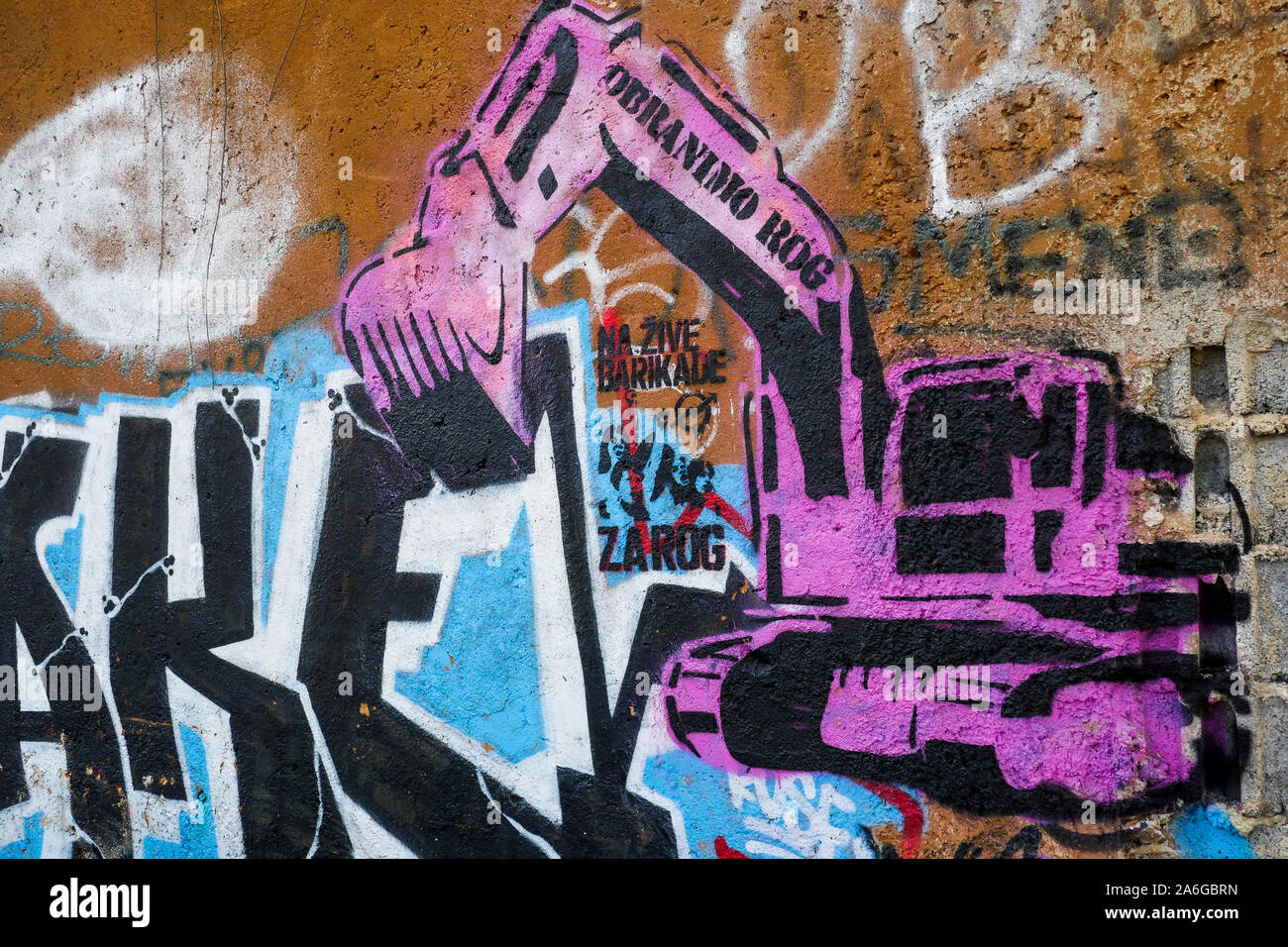 A painting on a wall figures a mechanical showel, as a symbol of ...