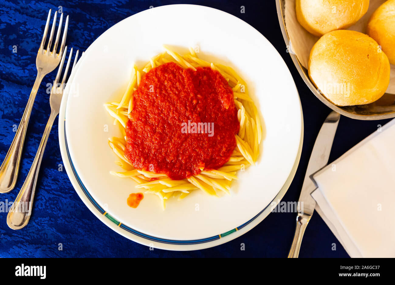 Trofie al pomodoro - spaghetti with tomato sauce. Italian cuisine Stock ...