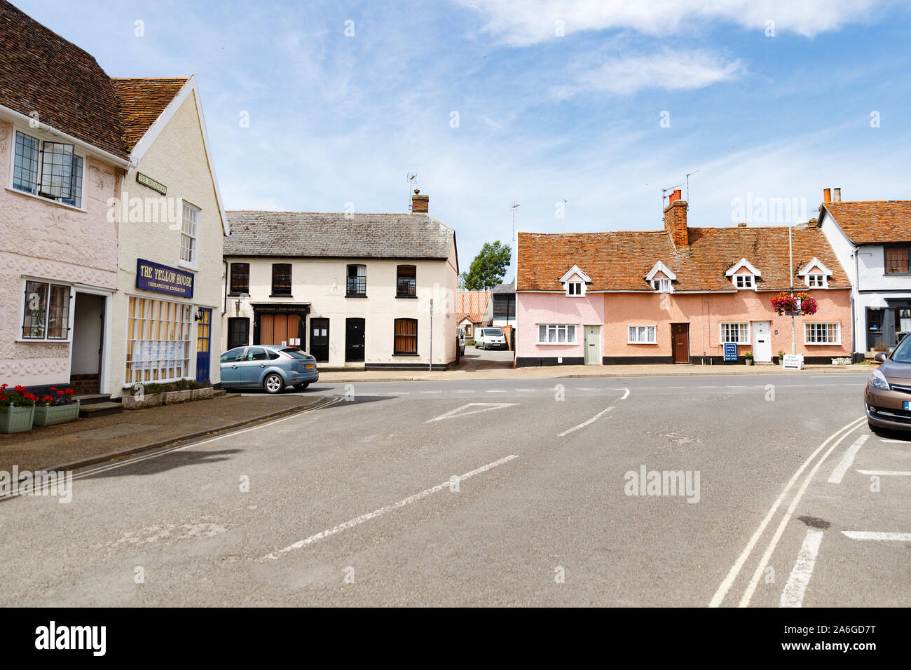 countryside street with traditional British houses, old-fashioned ...