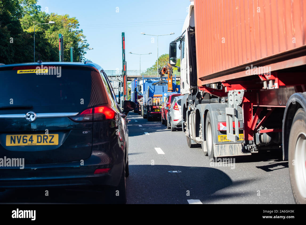 Queues of traffic, cars, vans and lorries on the A500, A50 motorway due ...