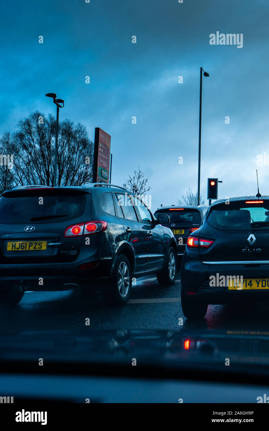 Traffic on the roads at winter time, cold conditions, city driving ...