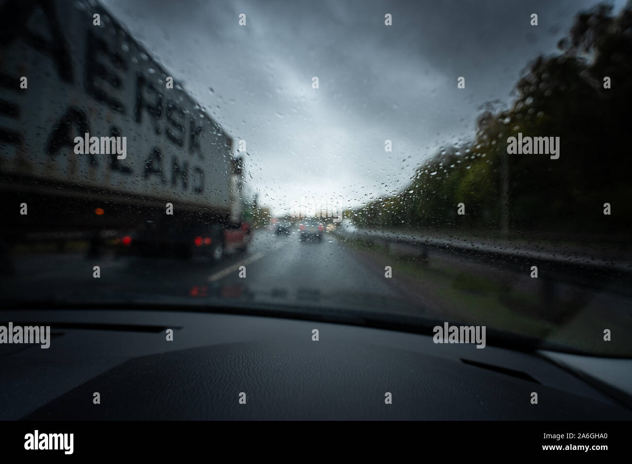 Rain on the motorway, heavy rain on the windshield, windscreen whilst ...