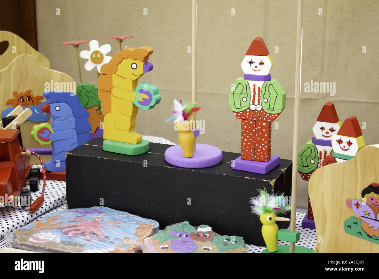 Children wooden toys in craft store, fun items Stock Photo - Alamy