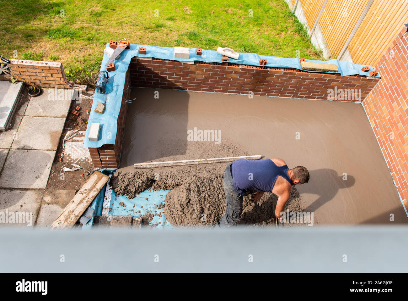 Work commences on the foundations of a conservatory base, laying ...