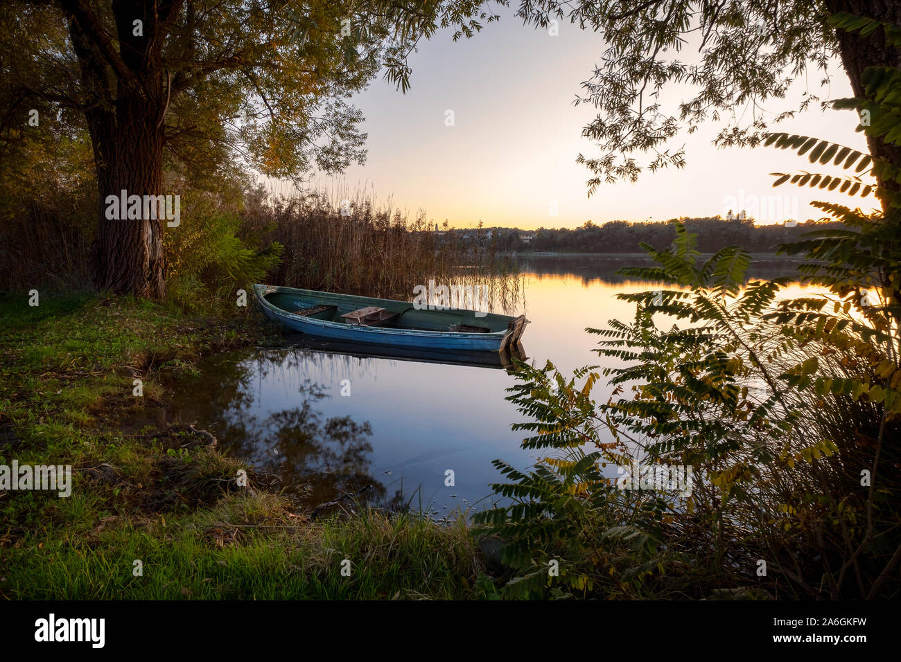Rowing boat in dusk hi-res stock photography and images - Alamy