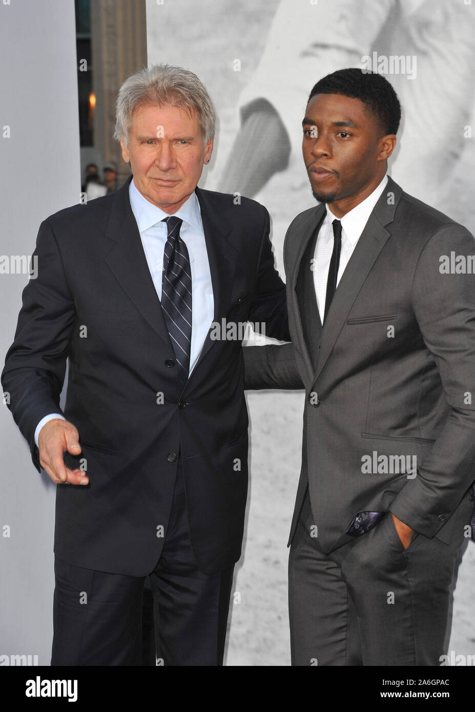LOS ANGELES, CA. April 09, 2013: Harrison Ford & Chadwick Boseman at ...