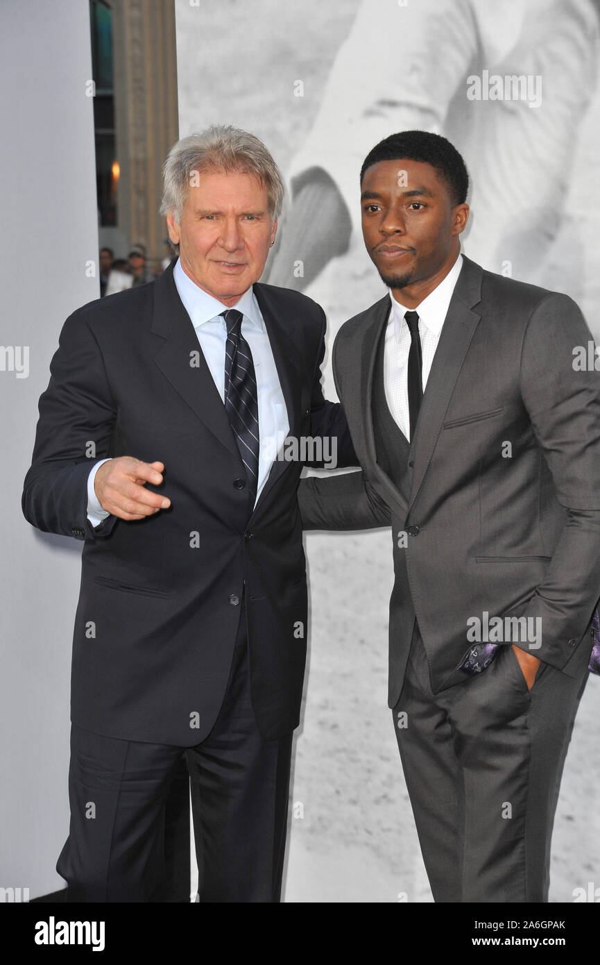 LOS ANGELES, CA. April 09, 2013: Harrison Ford & Chadwick Boseman at ...