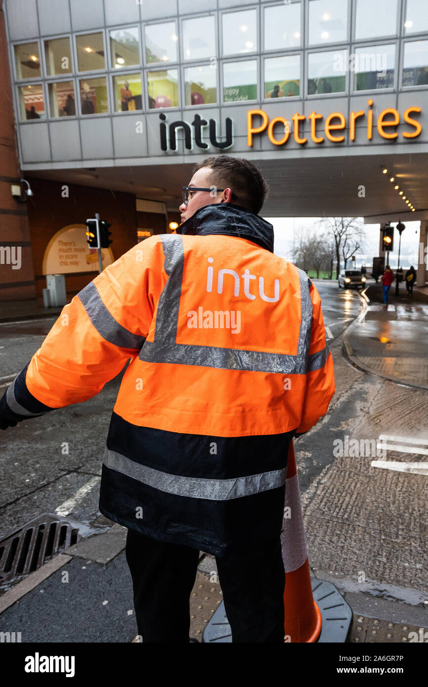 A worker for the Intu Potteries shopping centre, precinct, mall guides ...
