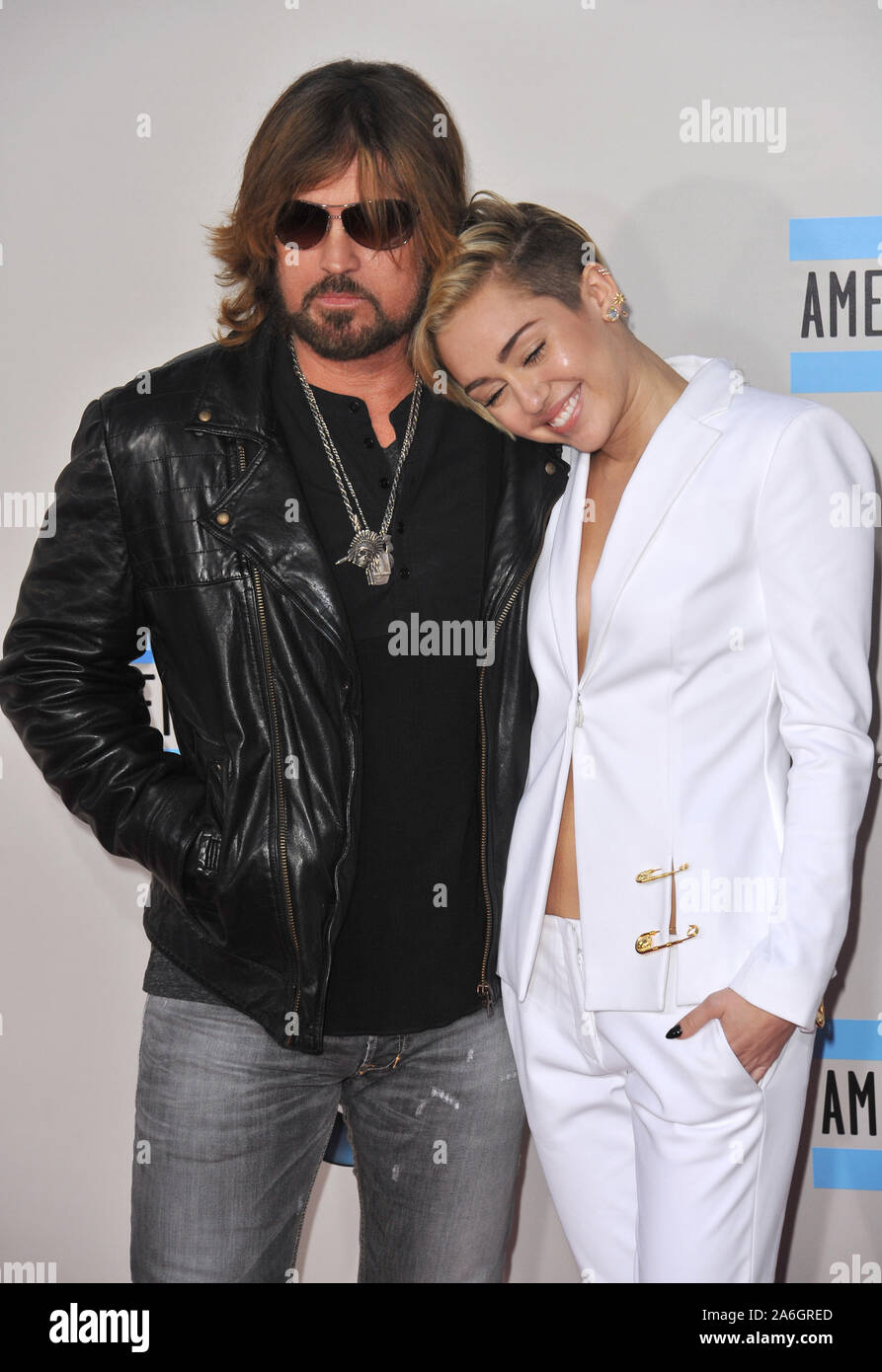 LOS ANGELES, CA - NOVEMBER 24, 2013: Miley Cyrus & father Billy Ray ...