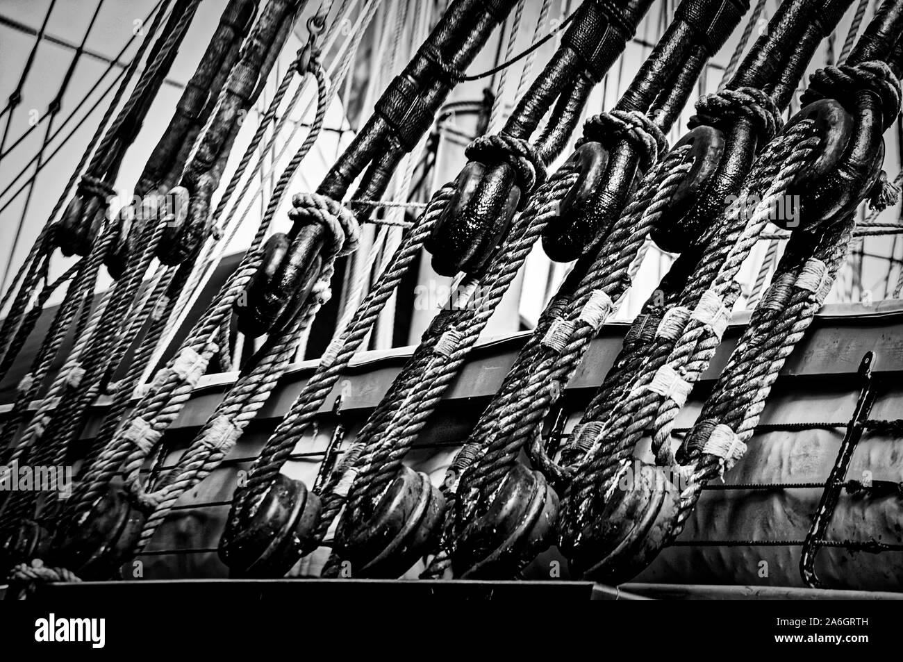 Mast, rigging and folded sails of a classic sailing ship Stock Photo ...