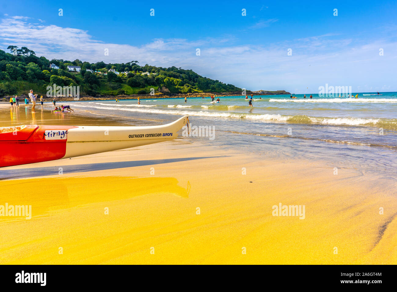 Beach goers sunbath, surf, kayak and enjoy family time at one of the ...