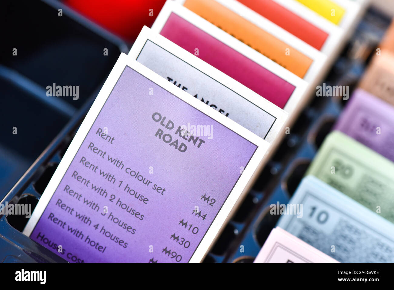 Monopoly board properties and money stacked neatly in the banking tray ...